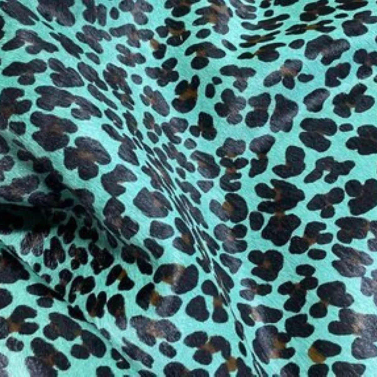 Stenciled Leopard on Turquoise Cowhide | Your Western Decor